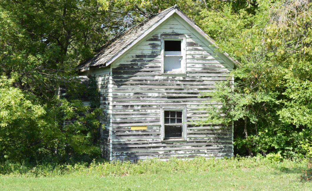 Small Town Saskatchewan: Old Building Attraction - K.L. Ditmars